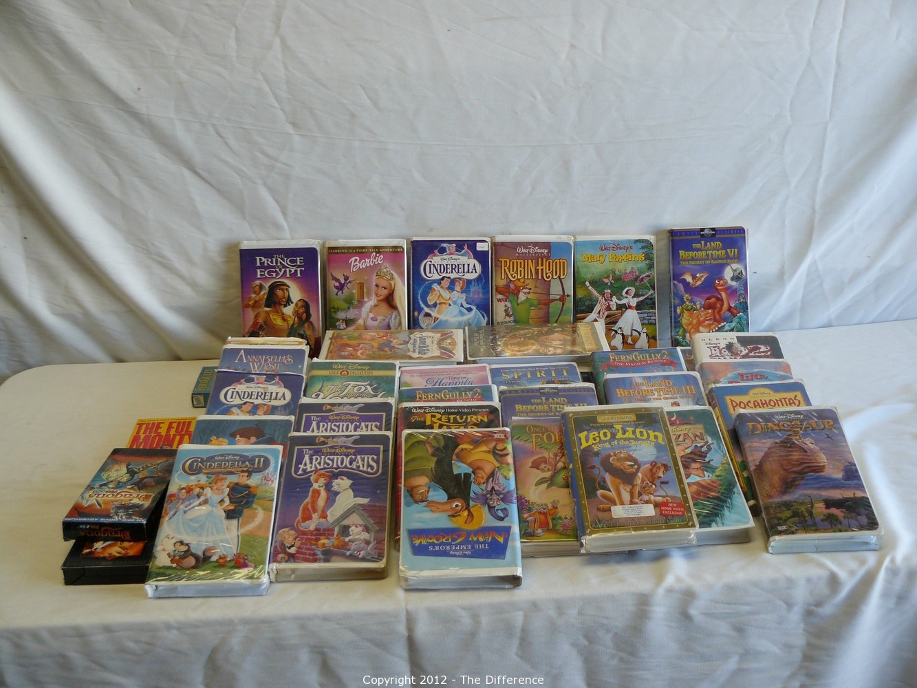 The Difference - Auction: Lloyd's June Liquidation Sale ITEM: 34 VHS Tapes